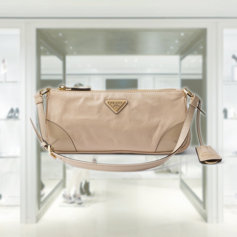 PRADA Prada Re-Edition 2002 small leather shoulder bag 1BC201_2CYR ...